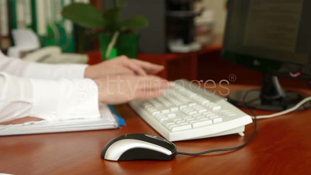 Businesswoman typing in an office focus on computer mouse 동영상 (VID ...