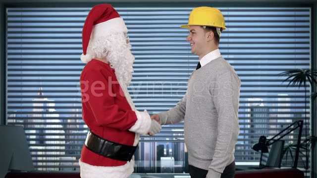 Santa Claus and Young Architect in a modern office 동영상 (VID_2275879 ...