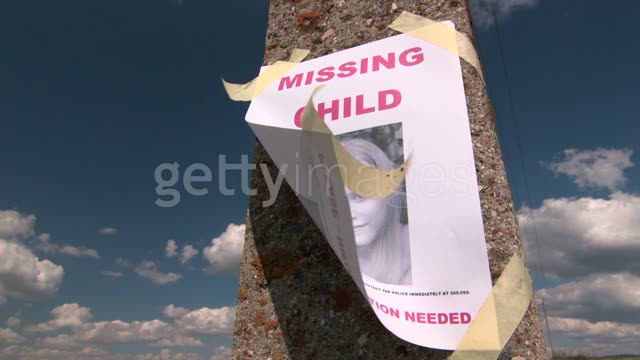 Missing person poster with photo of child are posted on pole 동영상 (VID ...