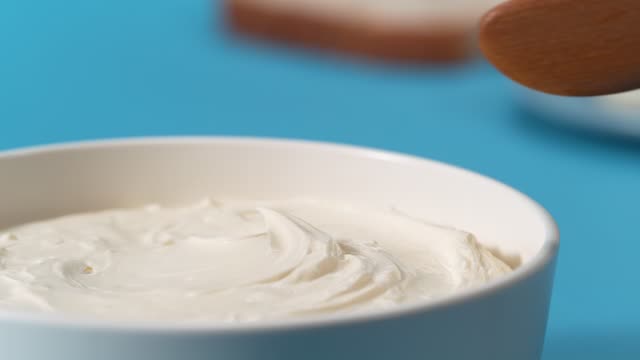 Studio shooting, high speed shooting - Caramel syrup and condensed milk ...