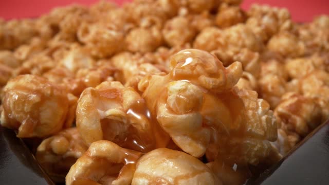 Studio shooting, high speed shooting - Syrup pouring on caramel popcorn ...