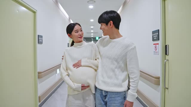 Hospital of Korea - Parturient woman and husband having conversation ...
