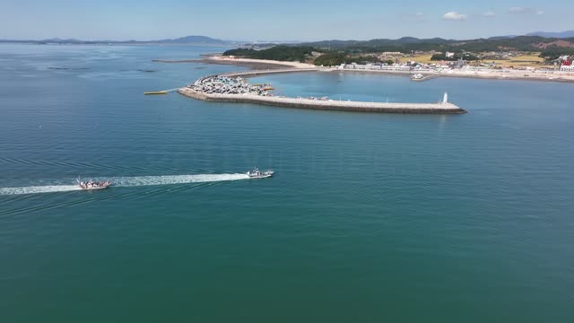 Namdang Port, beach, breakwater, light house and surroundings ...