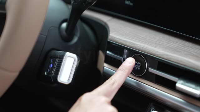 Car Maintenance - Pushing starting engine button and working shifting ...