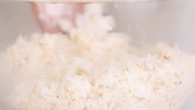 K-food - Cooking Class: Kimbap, mixing sesame oil and sesame seeds into ...