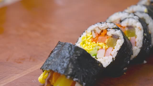 K-food - Cooking Class: Kimbap, completed kimbap neatly placed on ...