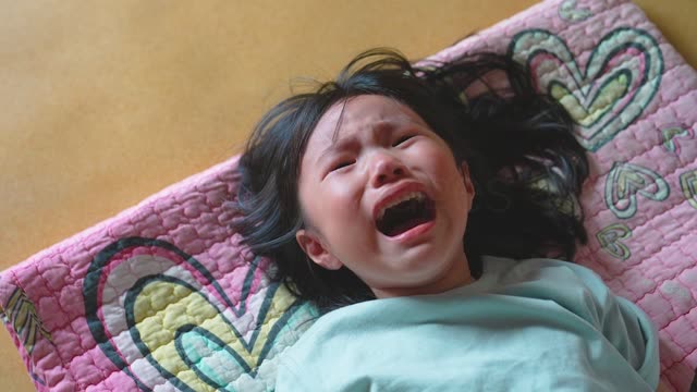Summer Vacation - Girl waking up crying from nap in country house ...