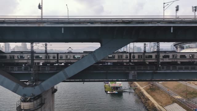 Seoul, Gwangjin-gu, Cheongdam Bridge, subway train, downtown and ...