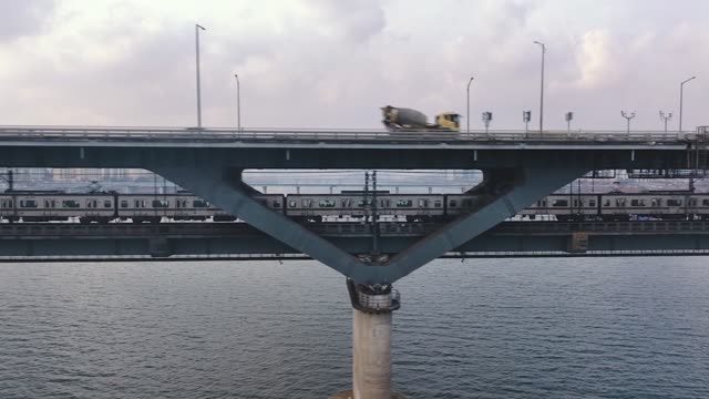 Seoul, Gwangjin-gu, Cheongdam Bridge, subway train, downtown and ...