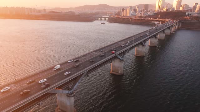Seoul, Gwangjin-gu, Cheongdam Bridge, downtown and cityscape at sunrise ...