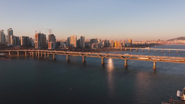 Seoul, Gwangjin-gu, Cheongdam Bridge, subway train, downtown and ...