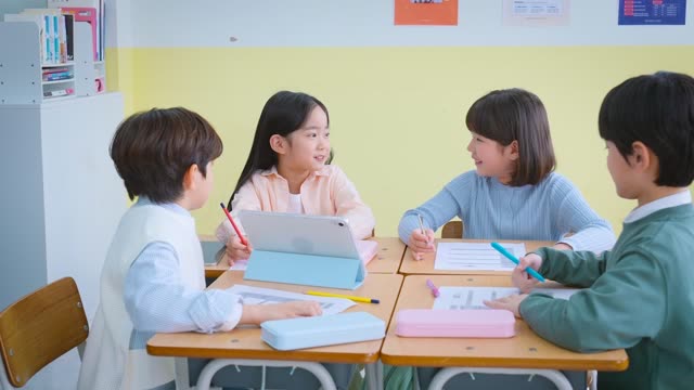 Shot in elementary school, students on debate gathering around in ...