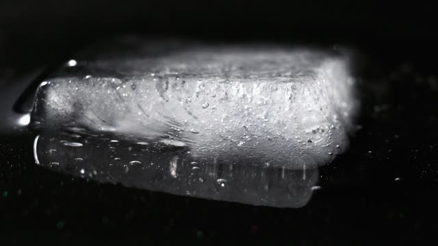 Shot in studio, process of melting ice cube / South Korea 동영상 (GD255933 ...