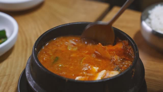 Close Up Tofu Kimchi Jjigae Korean Kimchi Stew With Tofu Boiling In Close Up Tofu Kimchi Jjigae Korean Kimchi Stew With Tofu Boiling In