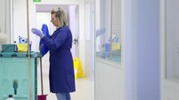 Portrait of happy professional female cleaner smiling in office (VID ...