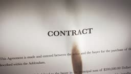 4 Closeup Of Contract In English Burning On Fire (VID_6318102) - 게티이미지뱅크
