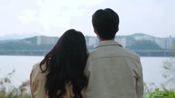 Youth V Log - Woman sitting on bench looking at the Han River and ...